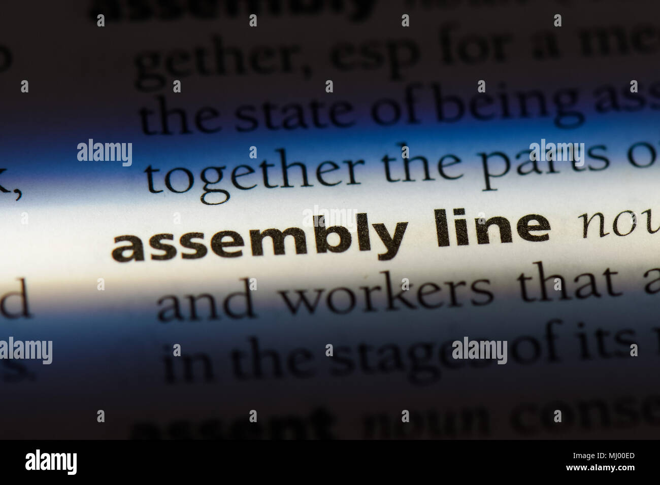 assembly line word in a dictionary. assembly line concept Stock Photo ...
