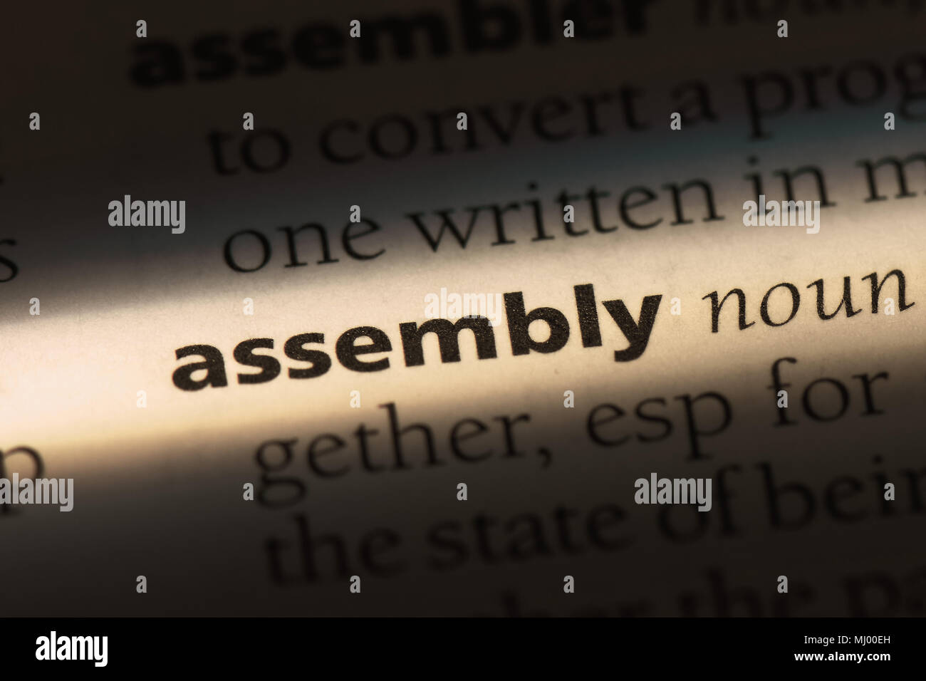 assembly word in a dictionary. assembly concept Stock Photo - Alamy