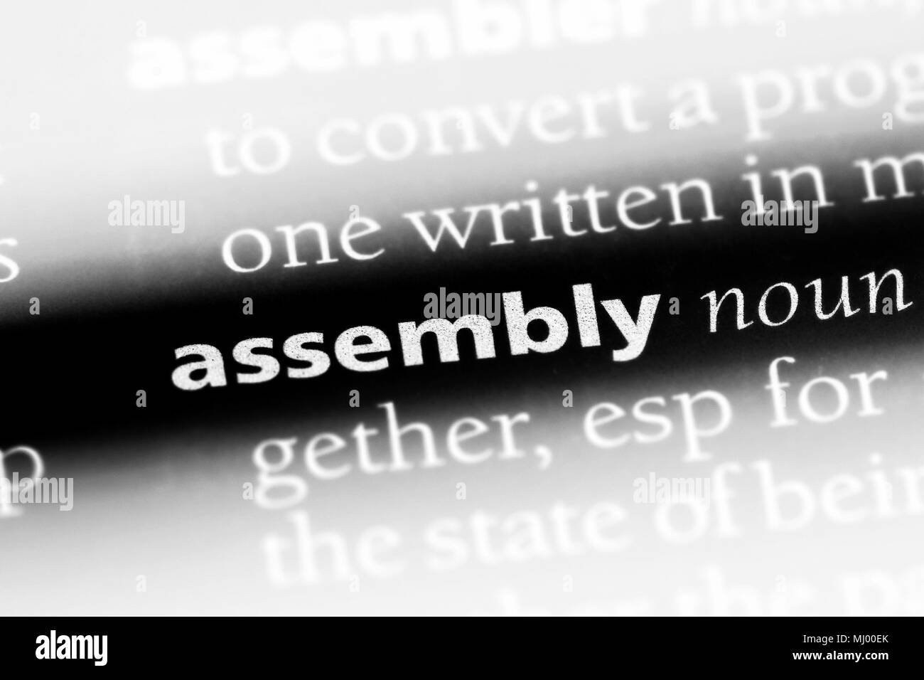 assembly word in a dictionary. assembly concept Stock Photo - Alamy