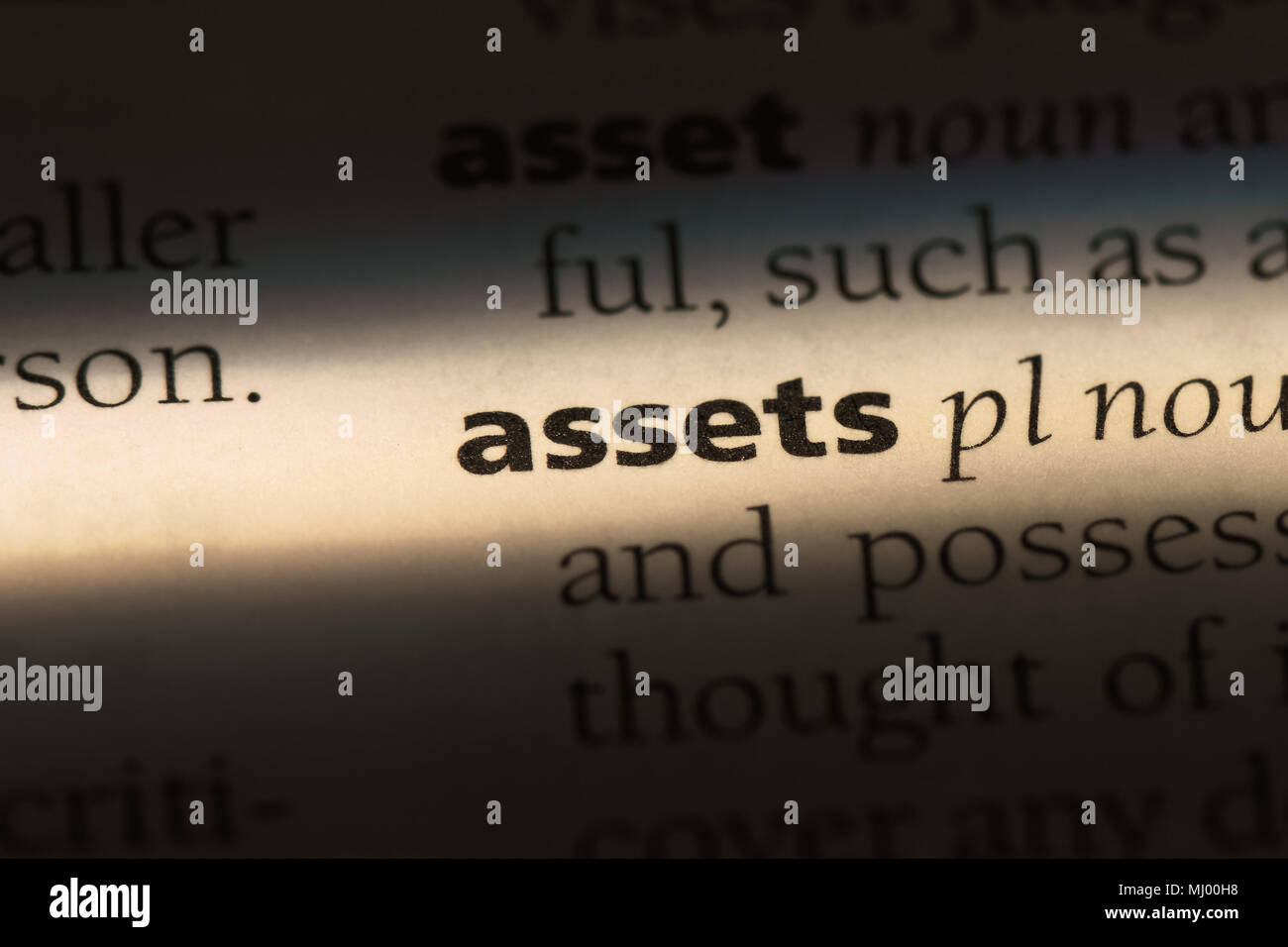 assets word in a dictionary. assets concept Stock Photo - Alamy