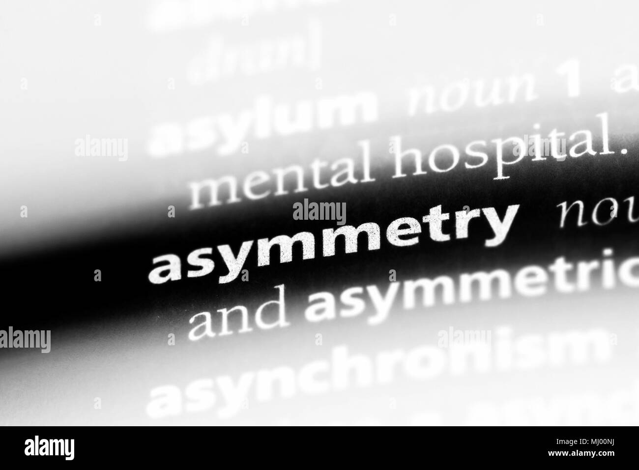asymmetry word in a dictionary. asymmetry concept Stock Photo - Alamy