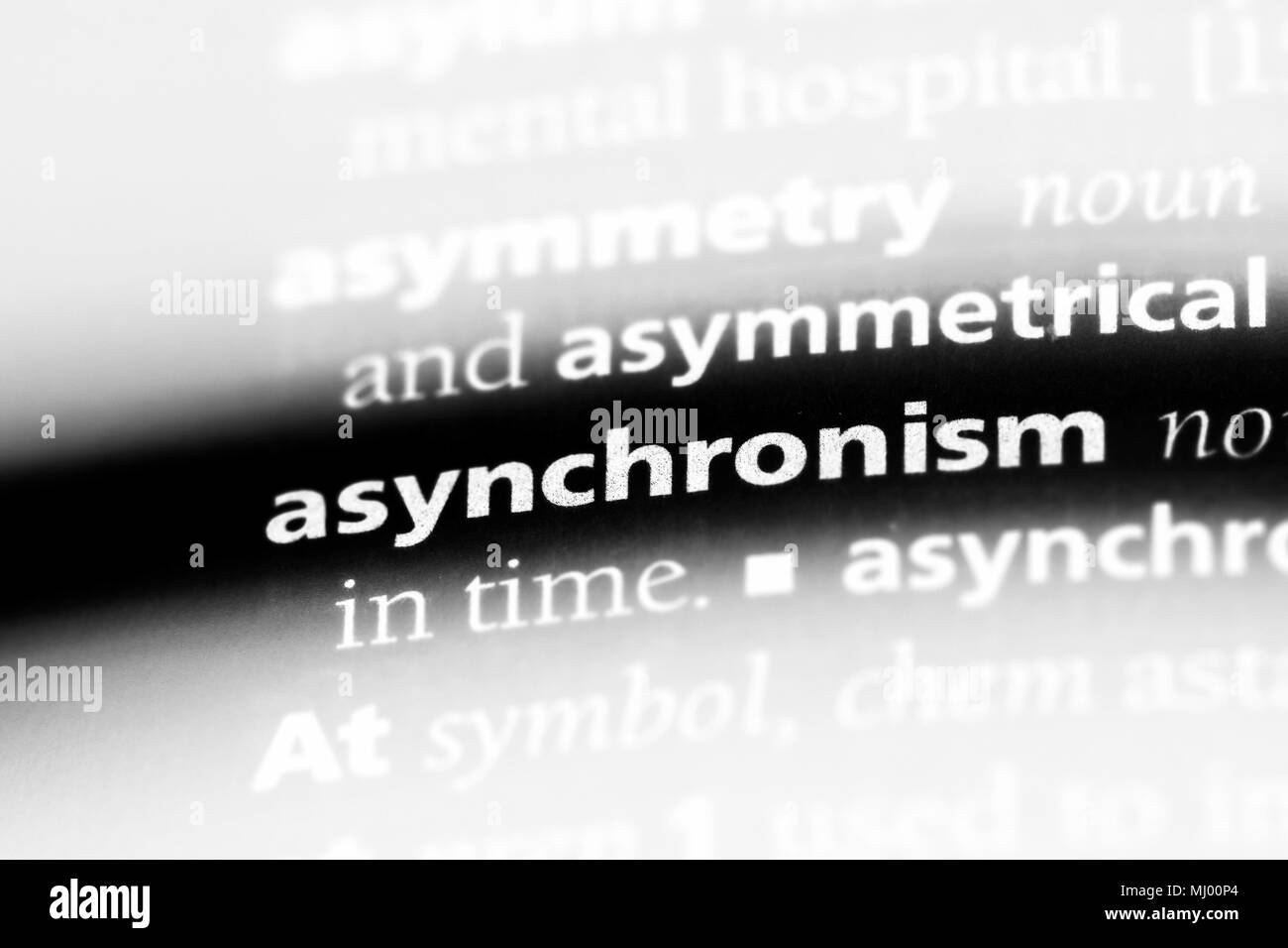 asynchronism word in a dictionary. asynchronism concept Stock Photo - Alamy