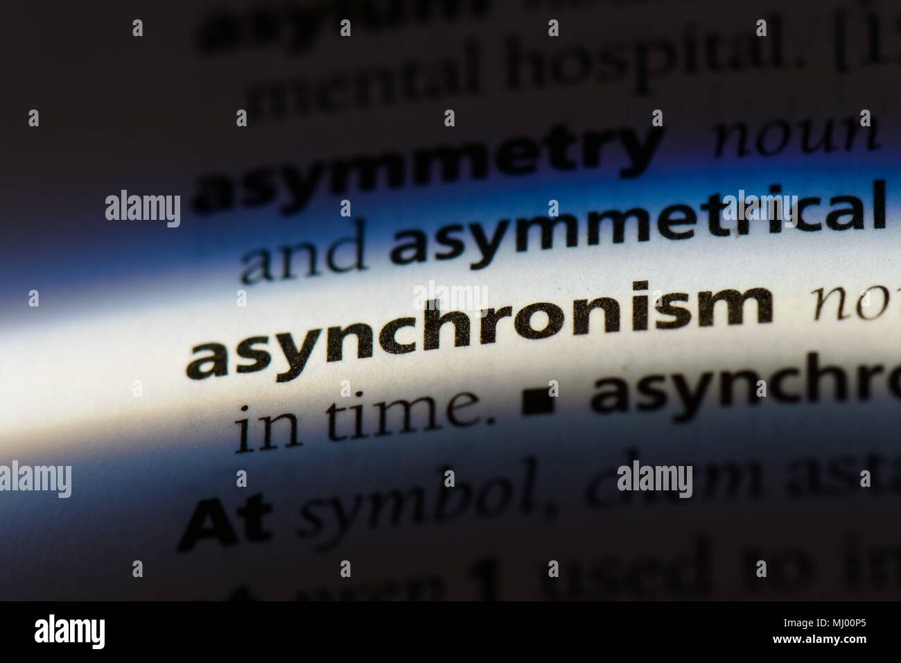 asynchronism word in a dictionary. asynchronism concept Stock Photo - Alamy