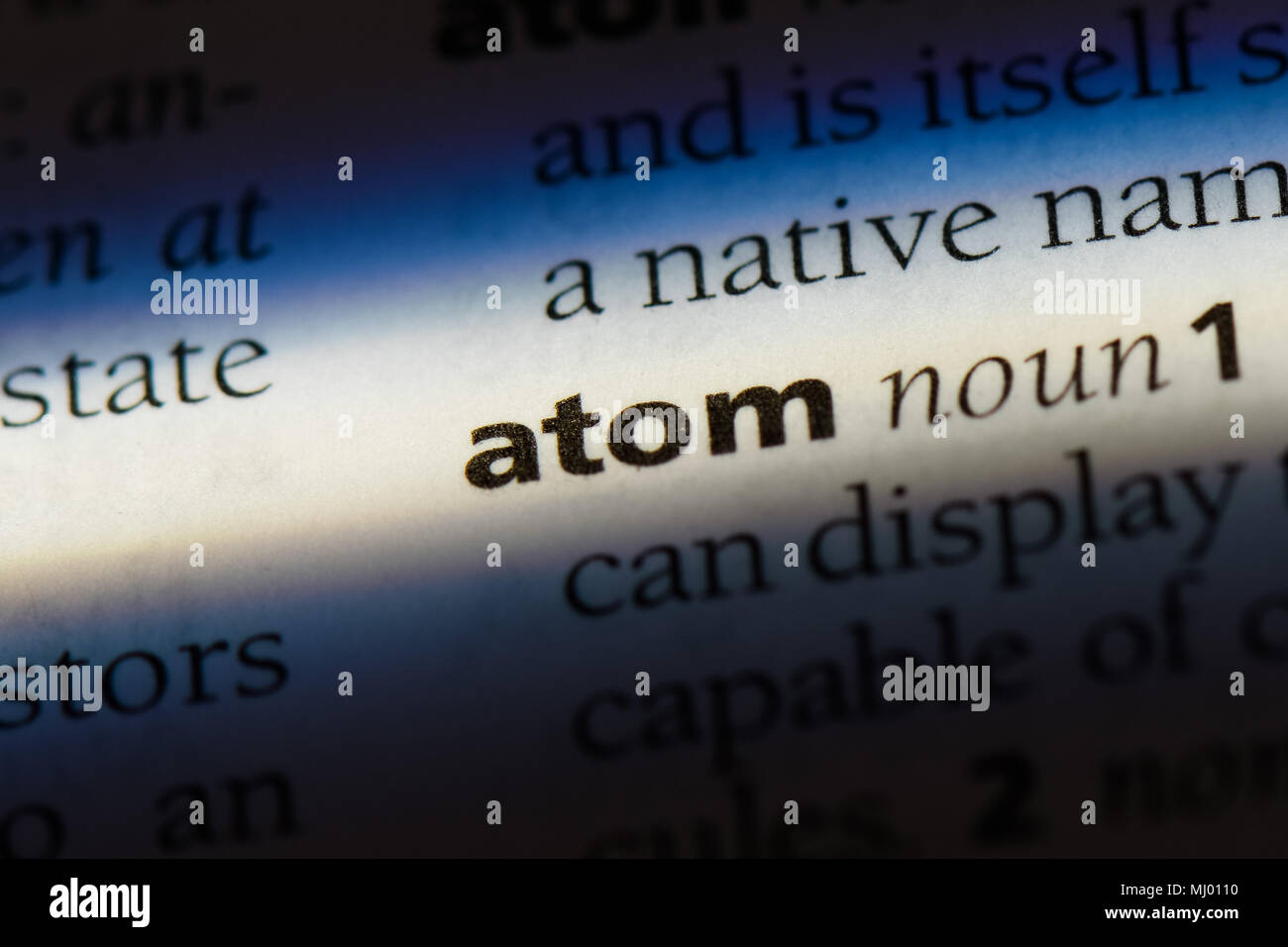 atom word in a dictionary. atom concept Stock Photo - Alamy