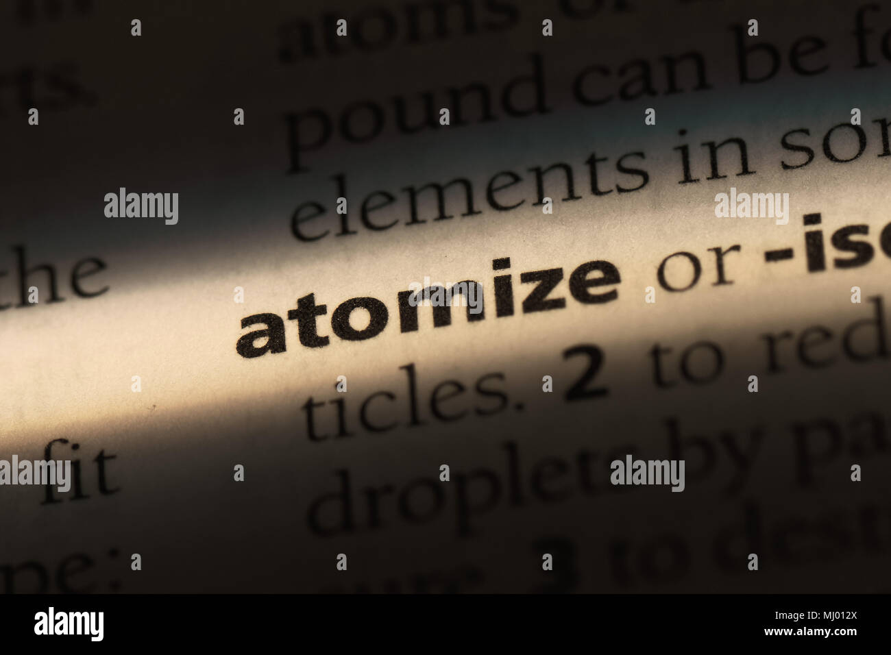 atomize word in a dictionary. atomize concept Stock Photo - Alamy