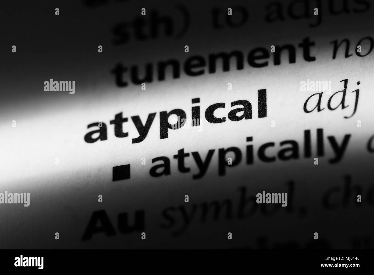 atypical word in a dictionary. atypical concept Stock Photo - Alamy
