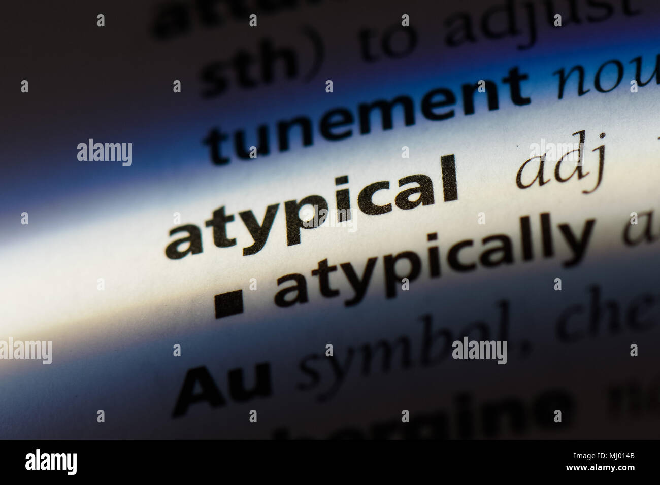 atypical word in a dictionary. atypical concept Stock Photo - Alamy