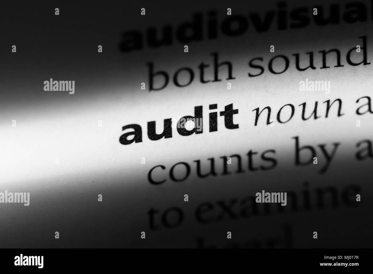 audit word in a dictionary. audit concept Stock Photo - Alamy