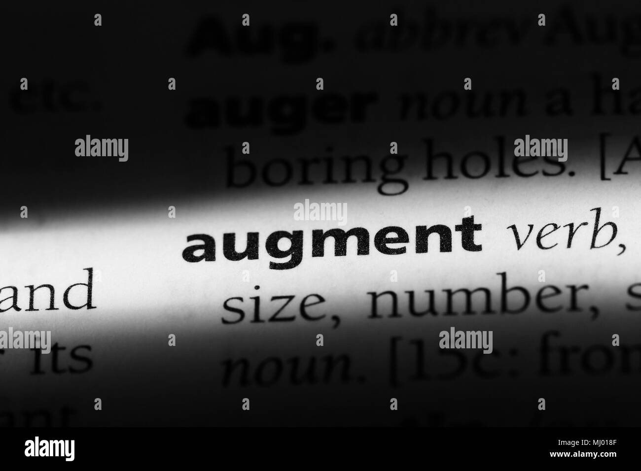 augment word in a dictionary. augment concept Stock Photo - Alamy