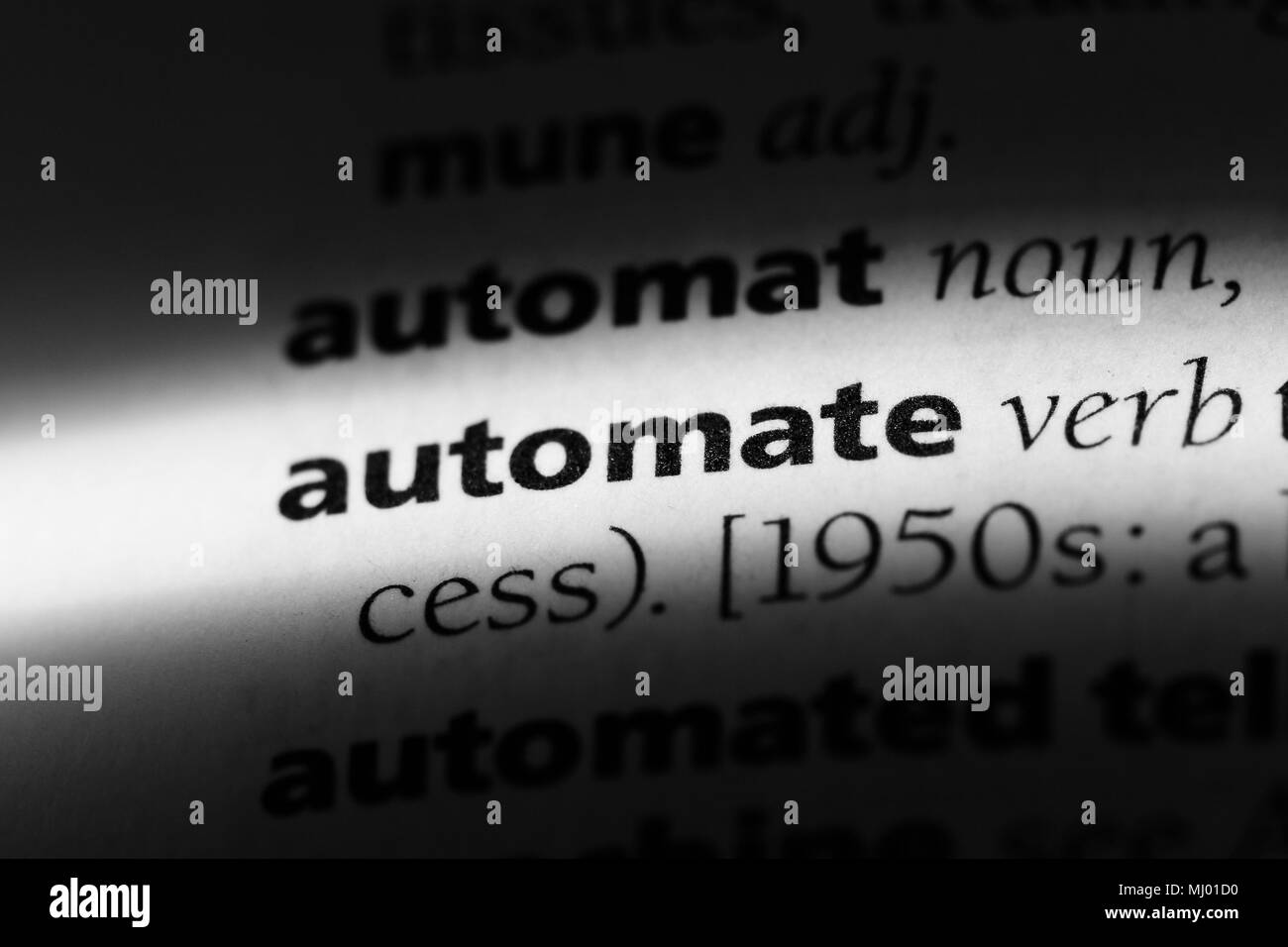 automate word in a dictionary. automate concept Stock Photo - Alamy