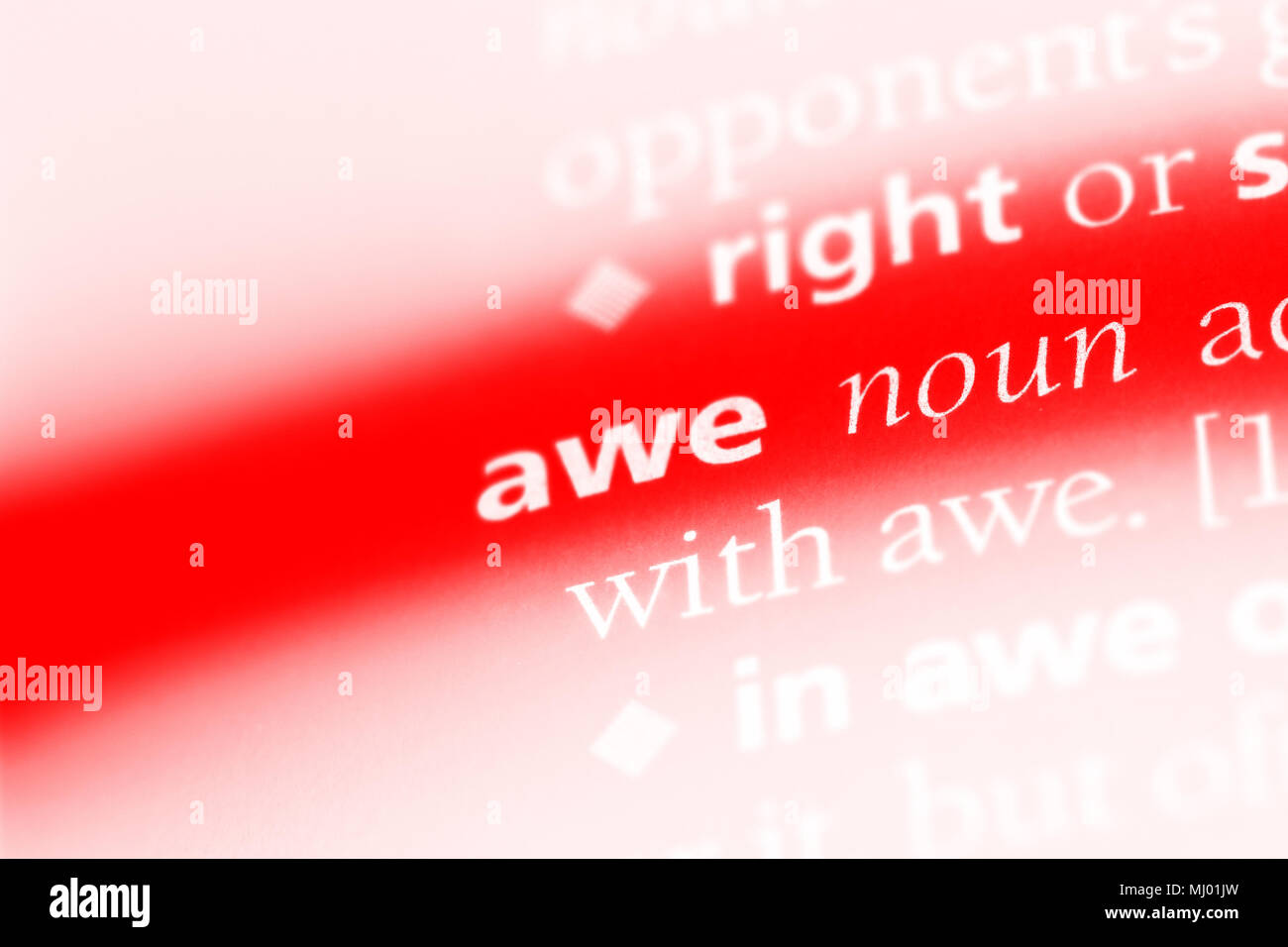 awe word in a dictionary. awe concept Stock Photo - Alamy