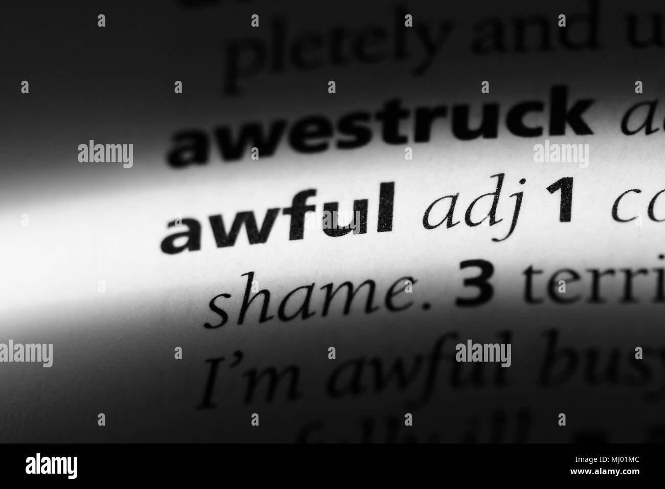 awful word in a dictionary. awful concept Stock Photo - Alamy
