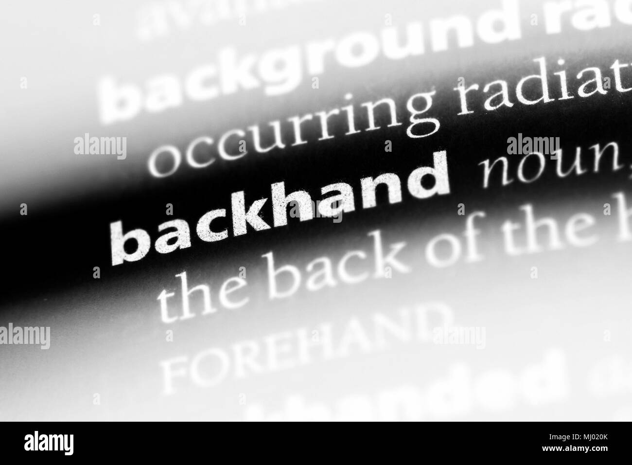 backhand word in a dictionary. backhand concept Stock Photo - Alamy