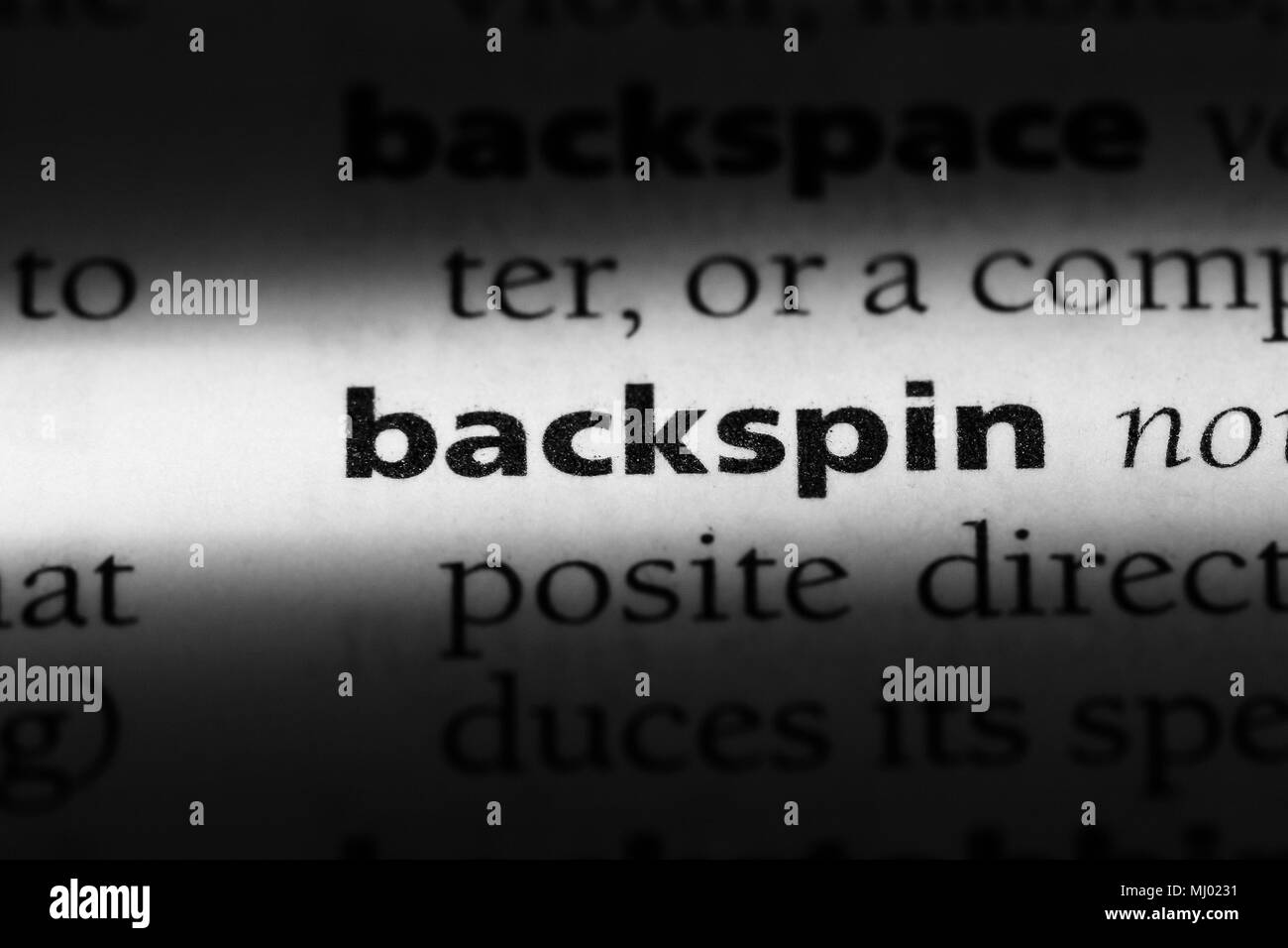 backspin word in a dictionary. backspin concept Stock Photo - Alamy