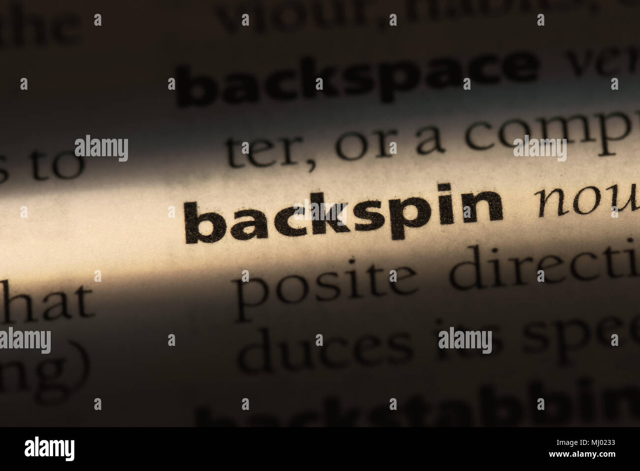 backspin word in a dictionary. backspin concept Stock Photo - Alamy