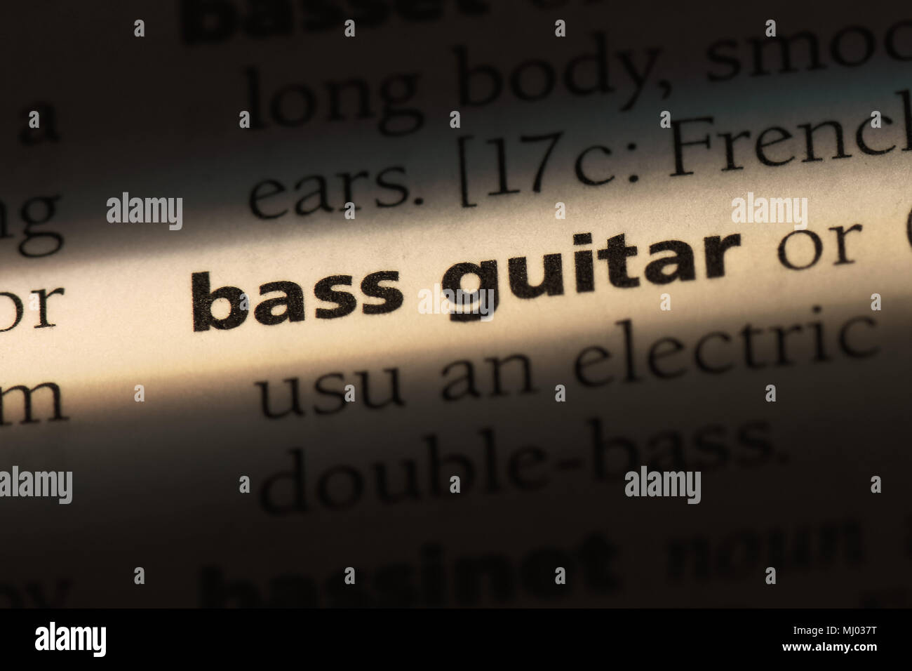 bass guitar word in a dictionary. bass guitar concept Stock Photo - Alamy
