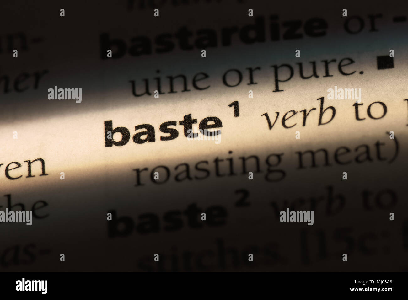 baste word in a dictionary. baste concept Stock Photo - Alamy