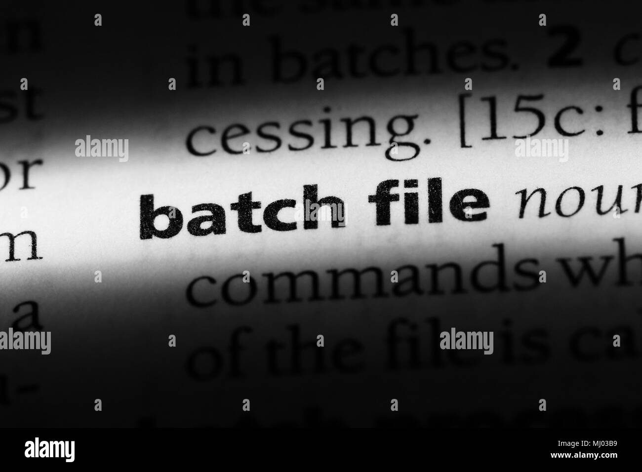 batch file word in a dictionary. batch file concept Stock Photo - Alamy