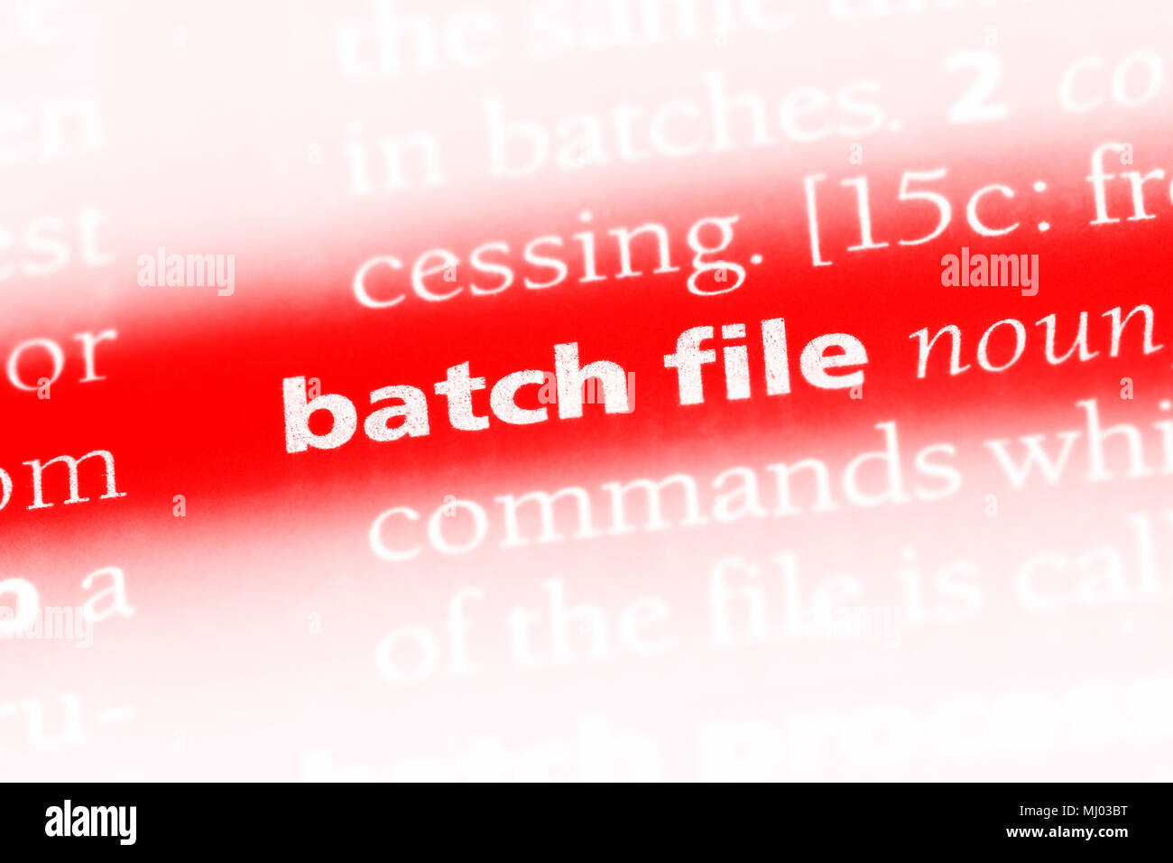 batch file word in a dictionary. batch file concept Stock Photo - Alamy