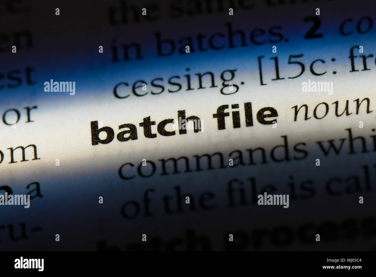 batch file word in a dictionary. batch file concept Stock Photo - Alamy