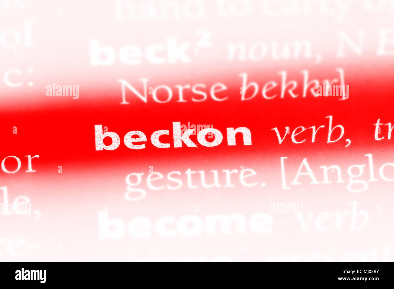 beckon word in a dictionary. beckon concept Stock Photo - Alamy