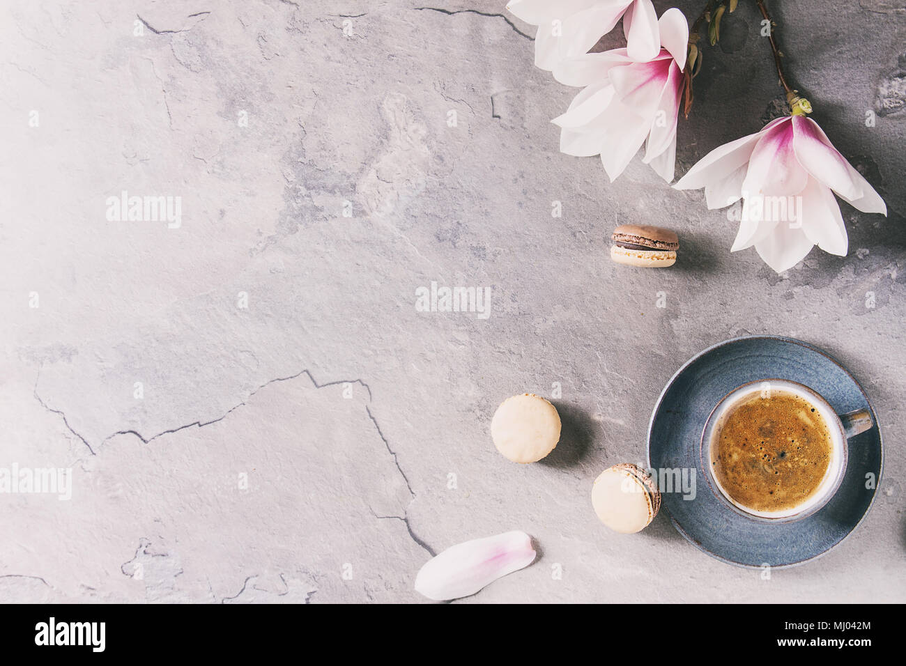 Coffee with spring flowers Stock Photo - Alamy