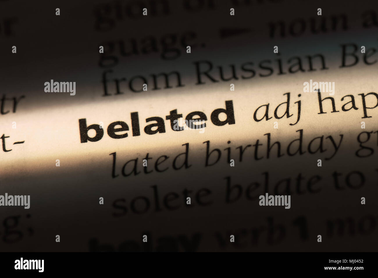 belated word in a dictionary. belated concept Stock Photo - Alamy