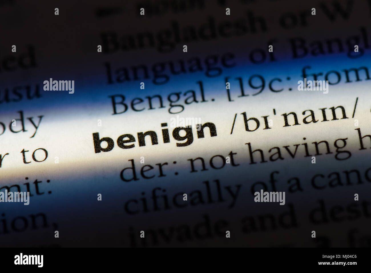 benign word in a dictionary. benign concept Stock Photo - Alamy