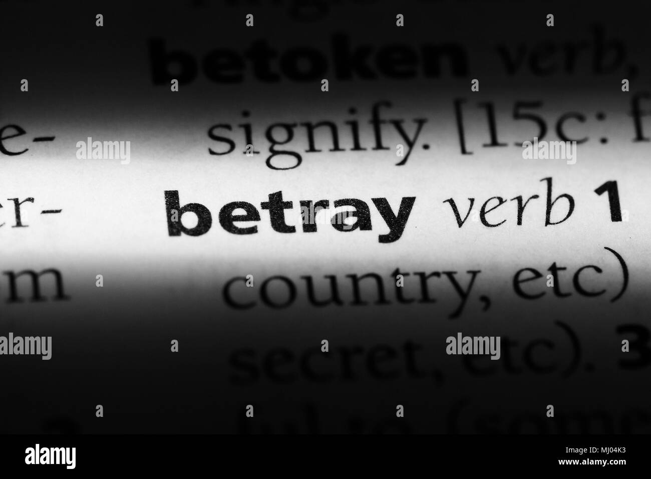 betray word in a dictionary. betray concept Stock Photo - Alamy