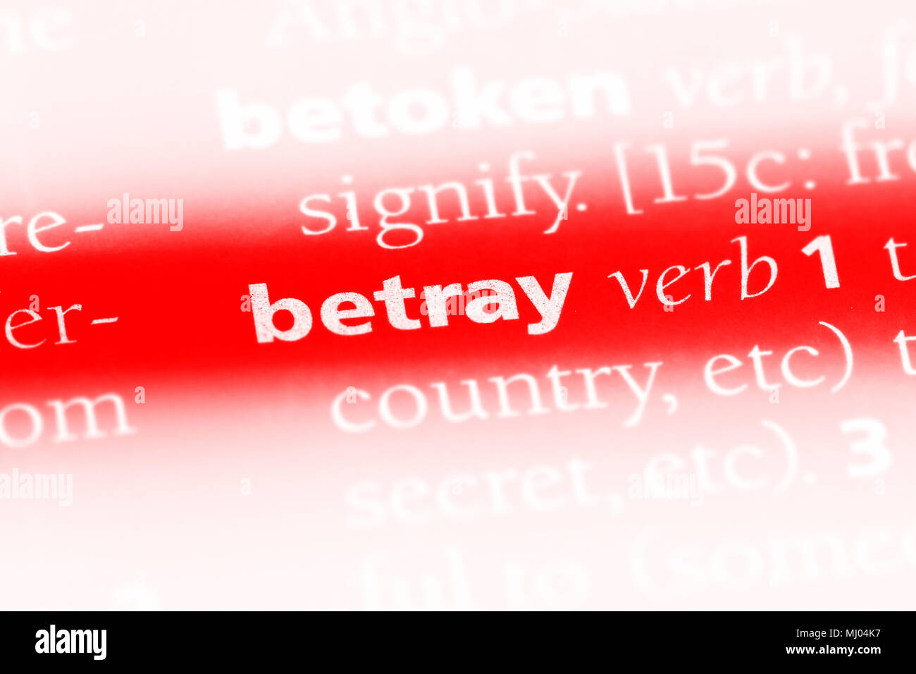 betray word in a dictionary. betray concept Stock Photo - Alamy
