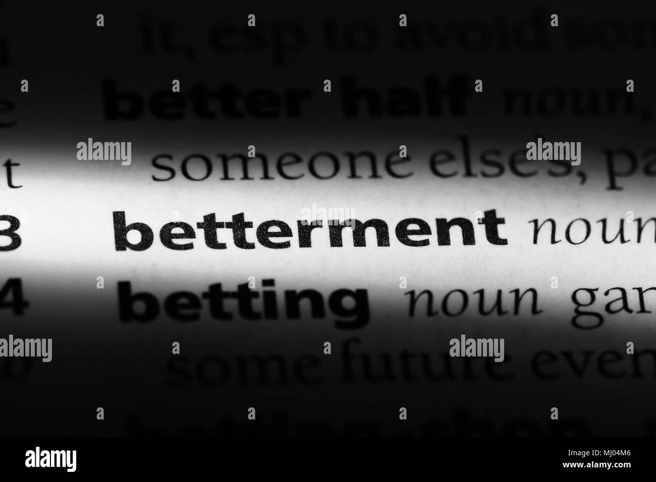 betterment word in a dictionary. betterment concept Stock Photo - Alamy