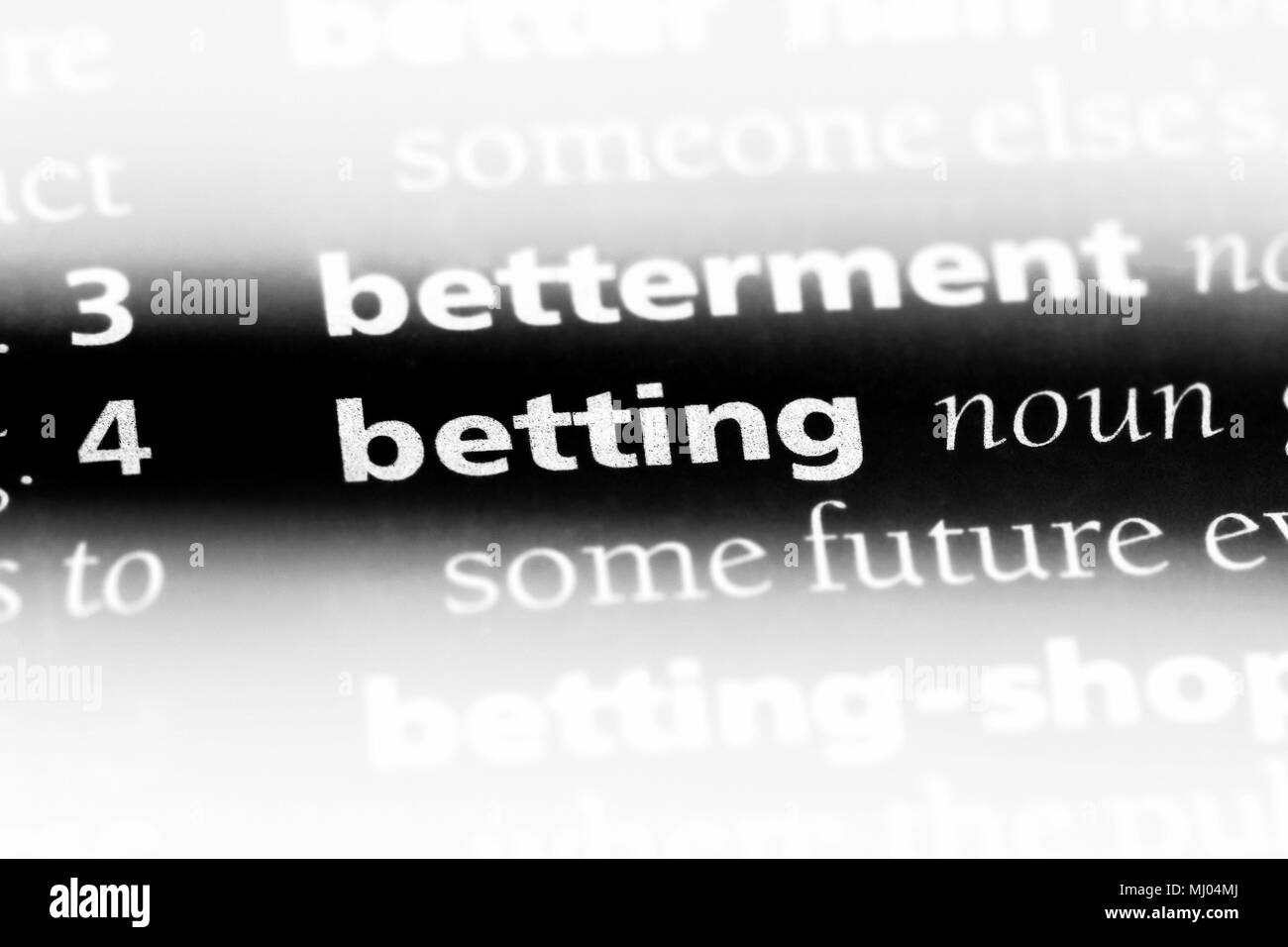 betting word in a dictionary. betting concept Stock Photo - Alamy