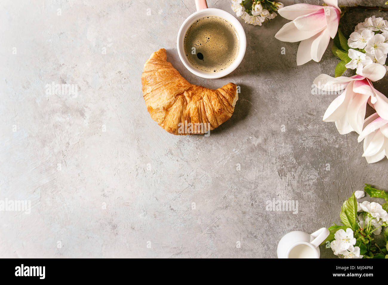 Coffee with spring flowers Stock Photo - Alamy