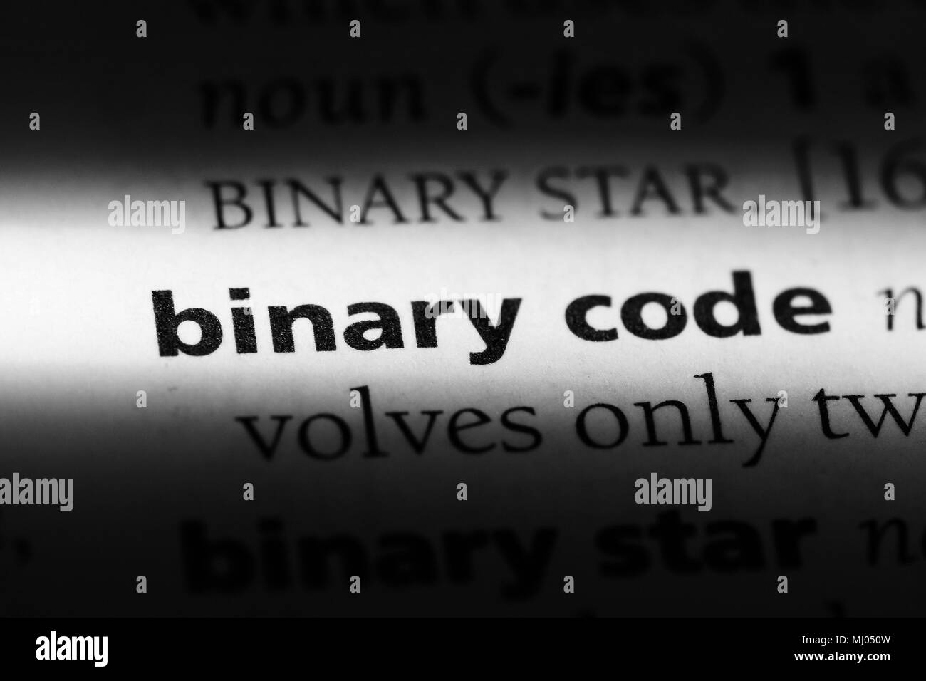 binary code word in a dictionary. binary code concept Stock Photo - Alamy