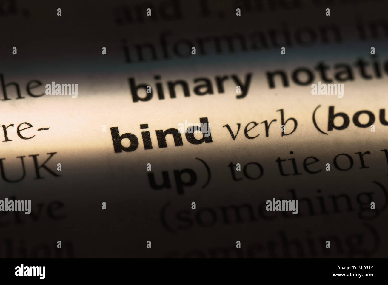 bind word in a dictionary. bind concept Stock Photo - Alamy