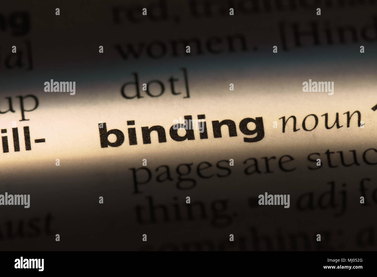 binding word in a dictionary. binding concept Stock Photo - Alamy