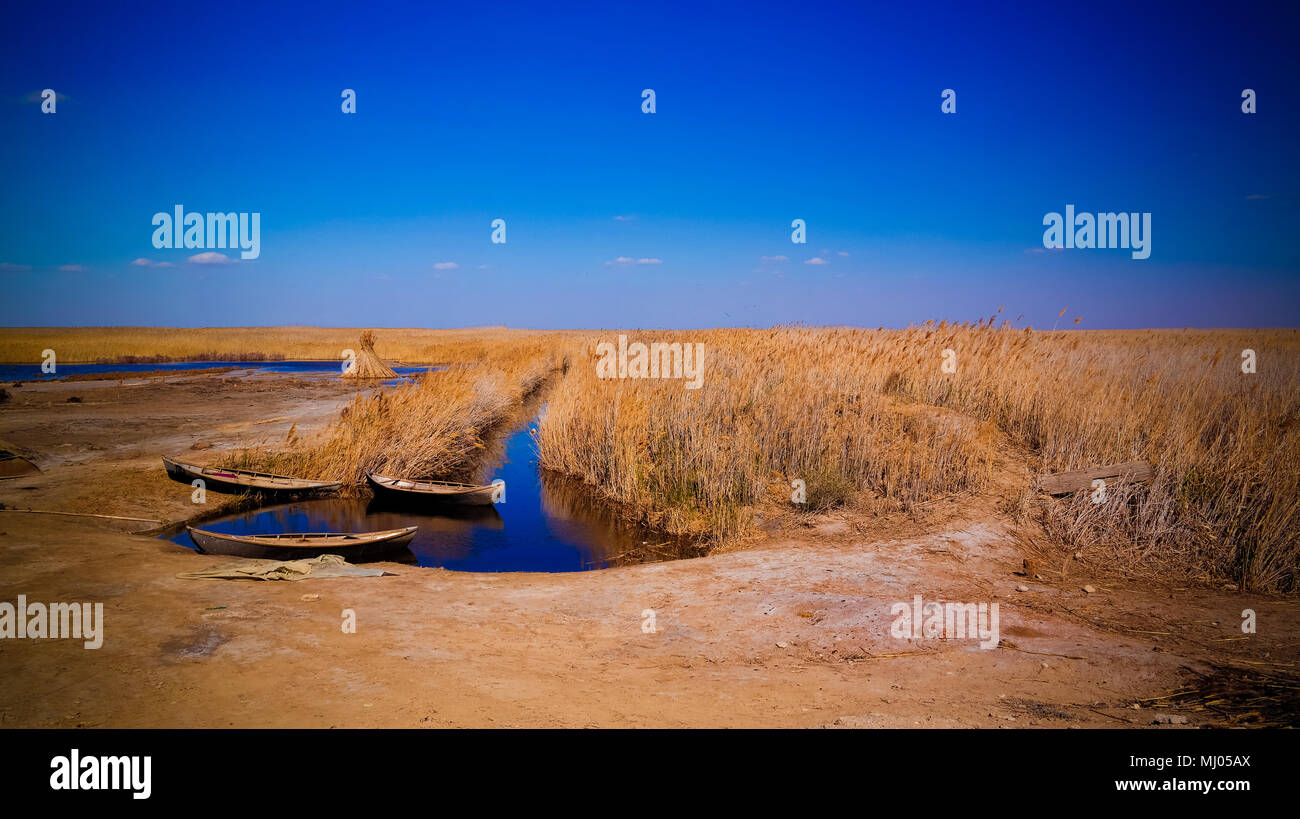 runed Urga fishing village at the shore of Sudochye lake aka part of ...