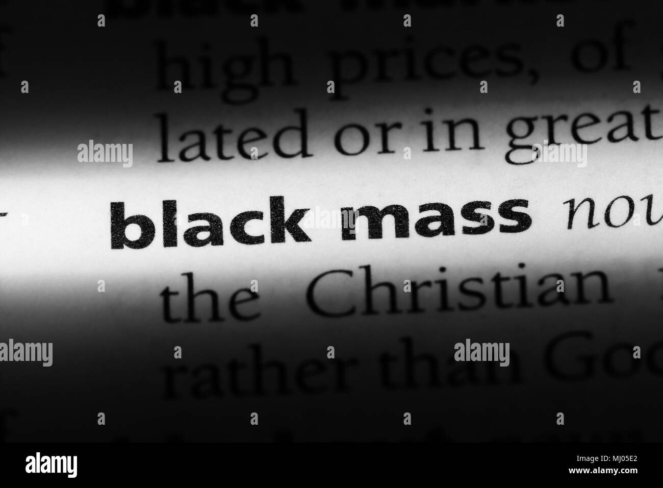 black mass word in a dictionary. black mass concept Stock Photo - Alamy
