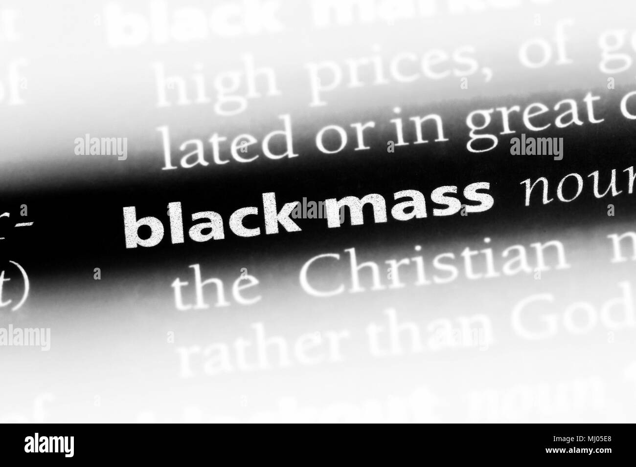 black mass word in a dictionary. black mass concept Stock Photo - Alamy