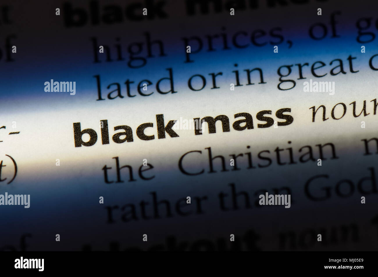 black mass word in a dictionary. black mass concept Stock Photo - Alamy