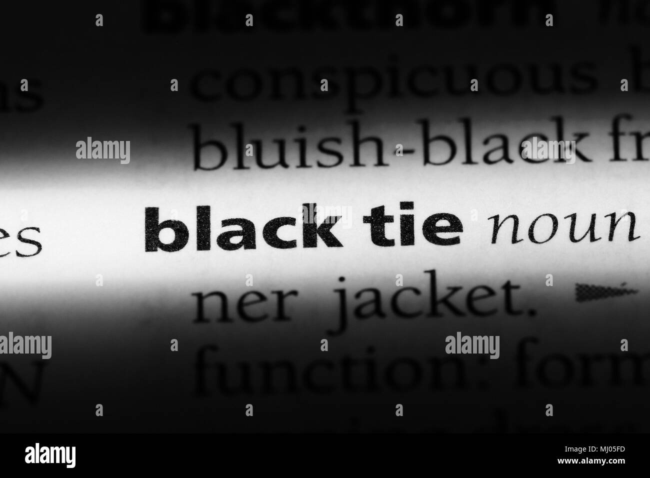 black tie word in a dictionary. black tie concept Stock Photo - Alamy