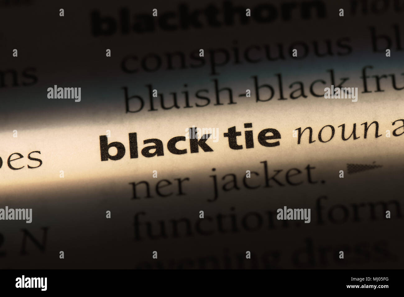 black tie word in a dictionary. black tie concept Stock Photo - Alamy