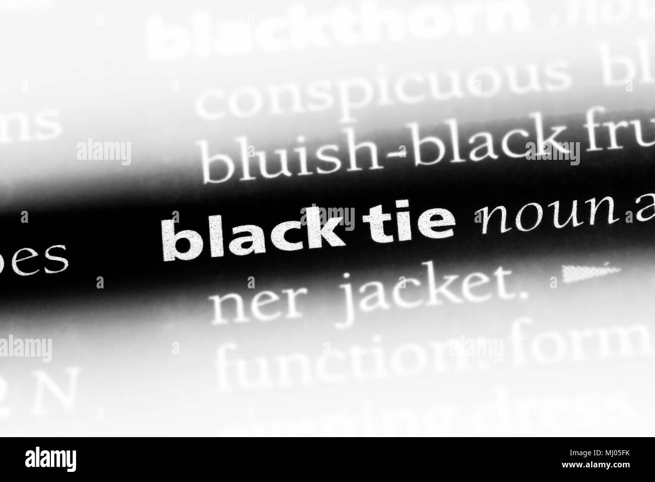 black tie word in a dictionary. black tie concept Stock Photo - Alamy