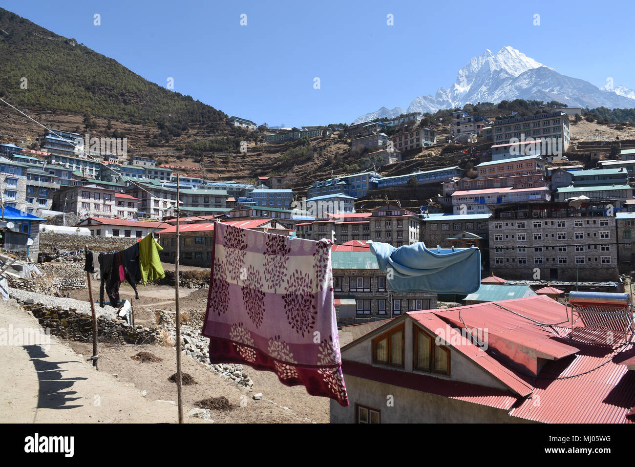 Hanging clothes on a line in Namche Bazaar, Nepal Stock Photo - Alamy