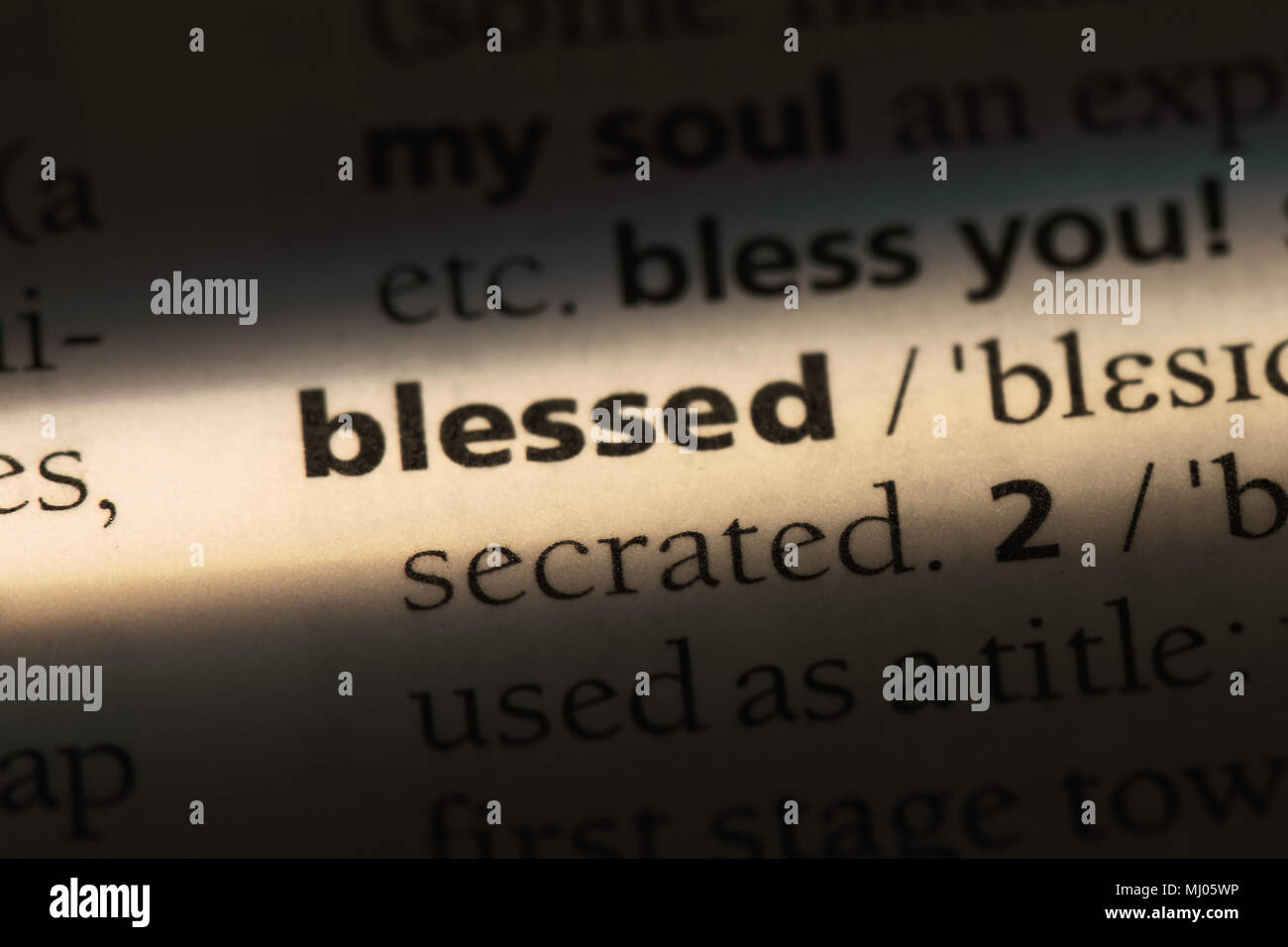 blessed word in a dictionary. blessed concept Stock Photo - Alamy