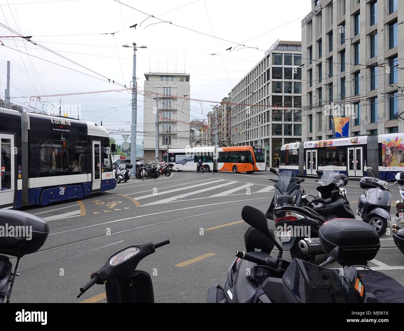 Public transportation, trams and buses at busy intersection. Geneva ...