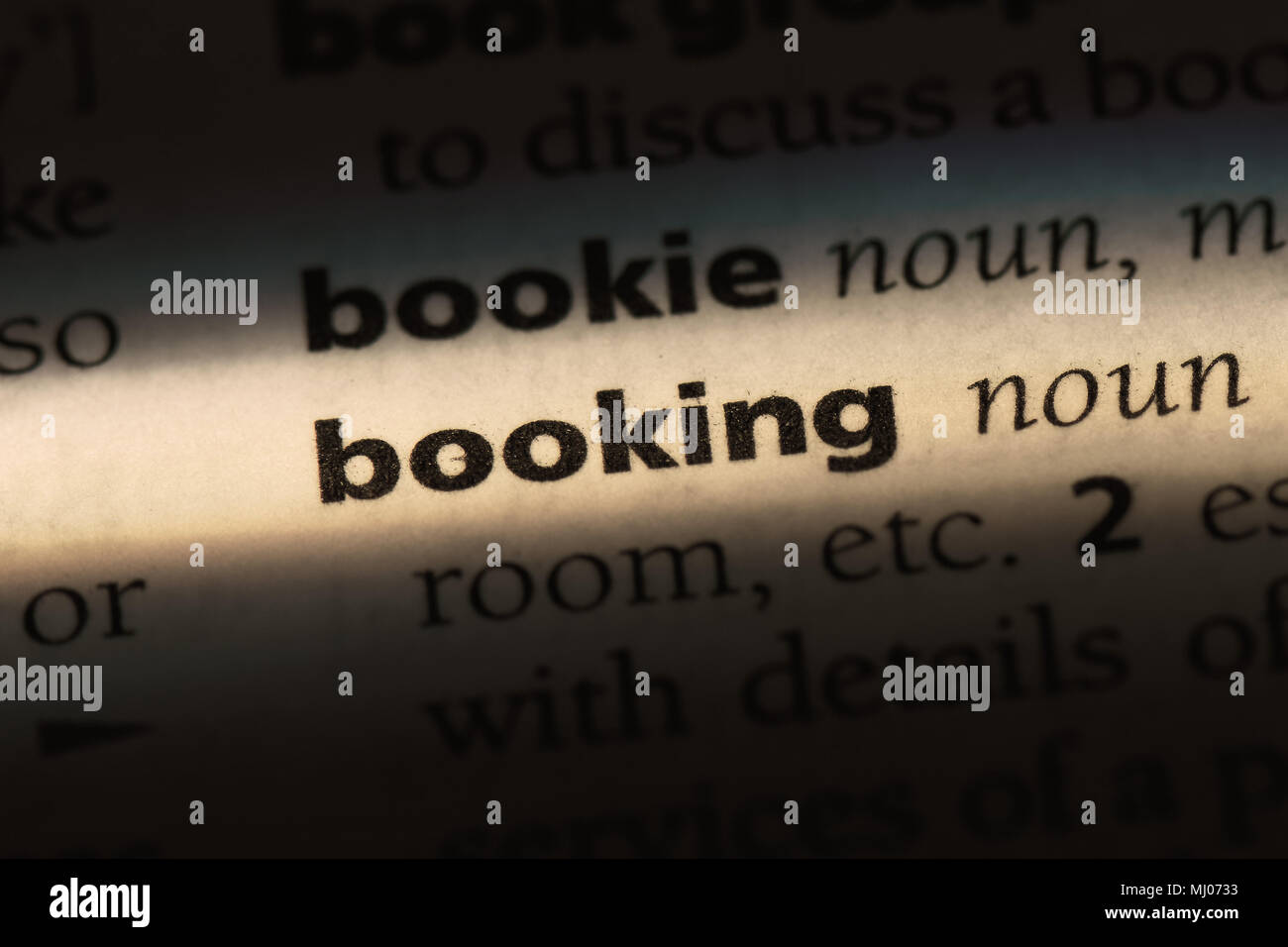 booking word in a dictionary. booking concept Stock Photo - Alamy