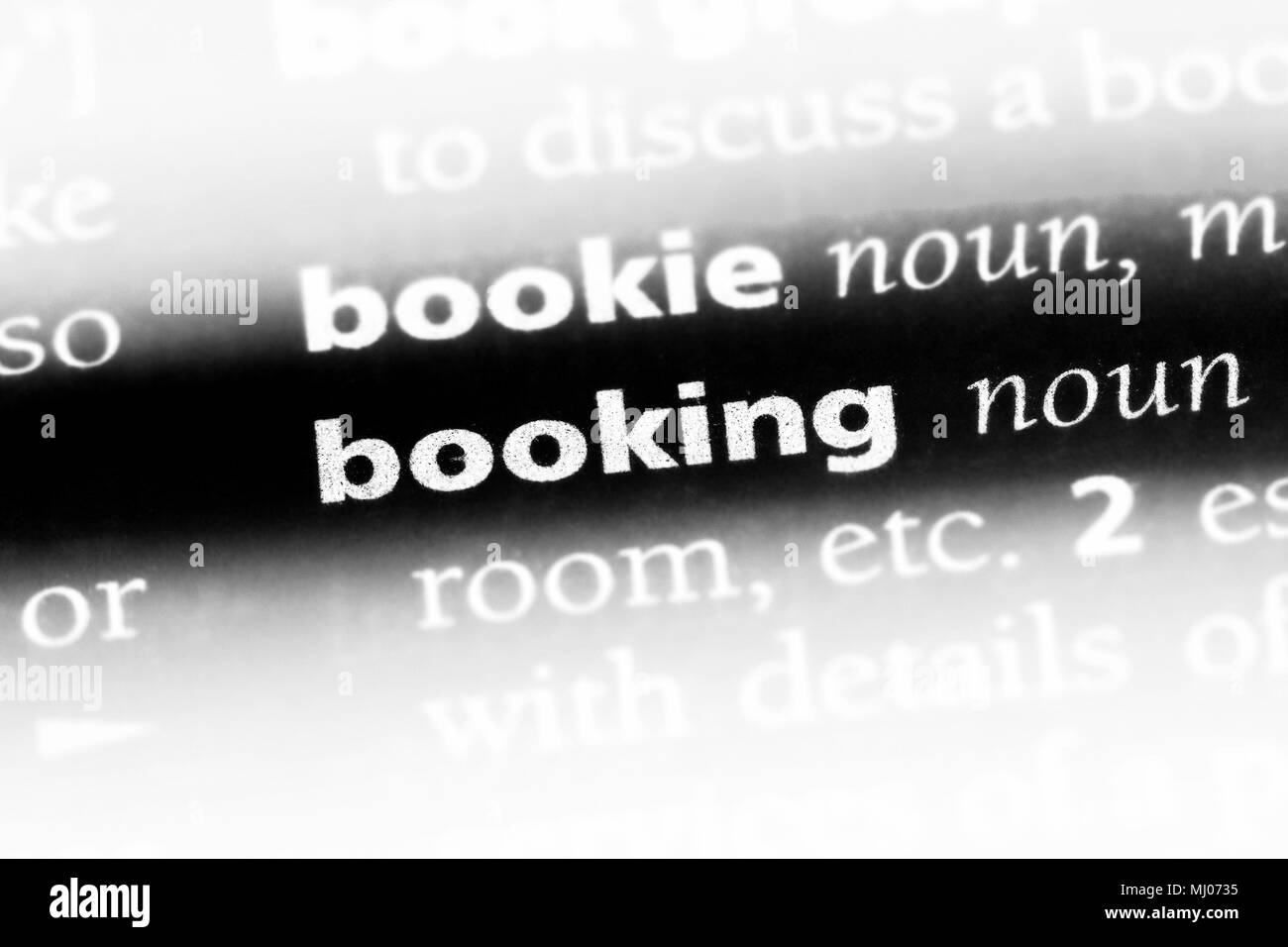 booking word in a dictionary. booking concept Stock Photo - Alamy