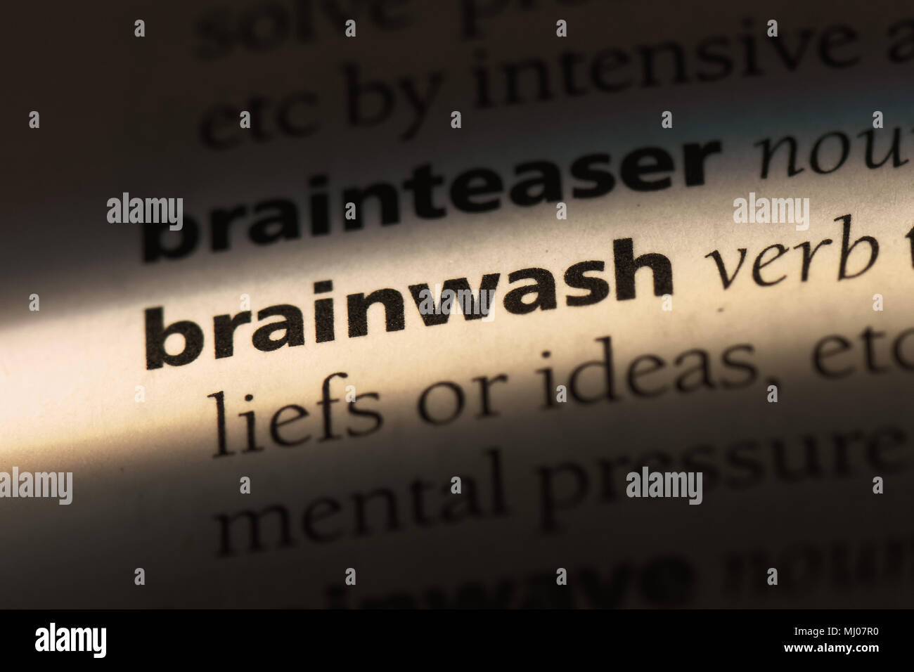 brainwash word in a dictionary. brainwash concept Stock Photo - Alamy