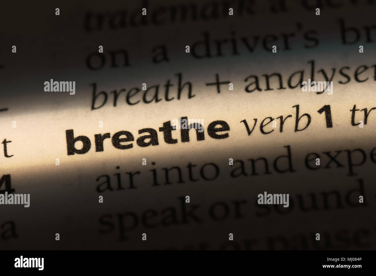 breathe word in a dictionary. breathe concept Stock Photo - Alamy